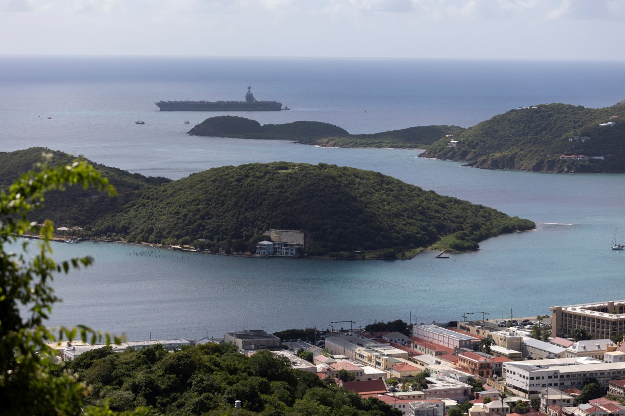 Trump’s military buildup in Caribbean limits his options in Iran